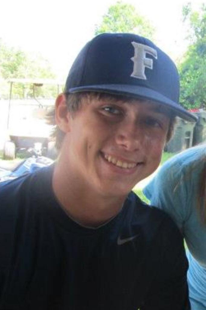 Foley football player Chris Dillon quickly goes from the football field ...